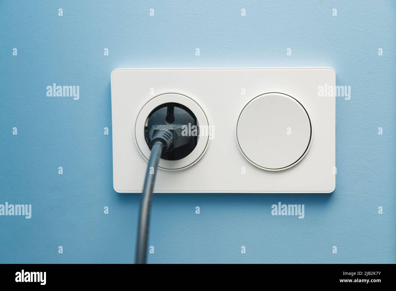 Integrated switch with socket. electric socket with plug cord and a ...