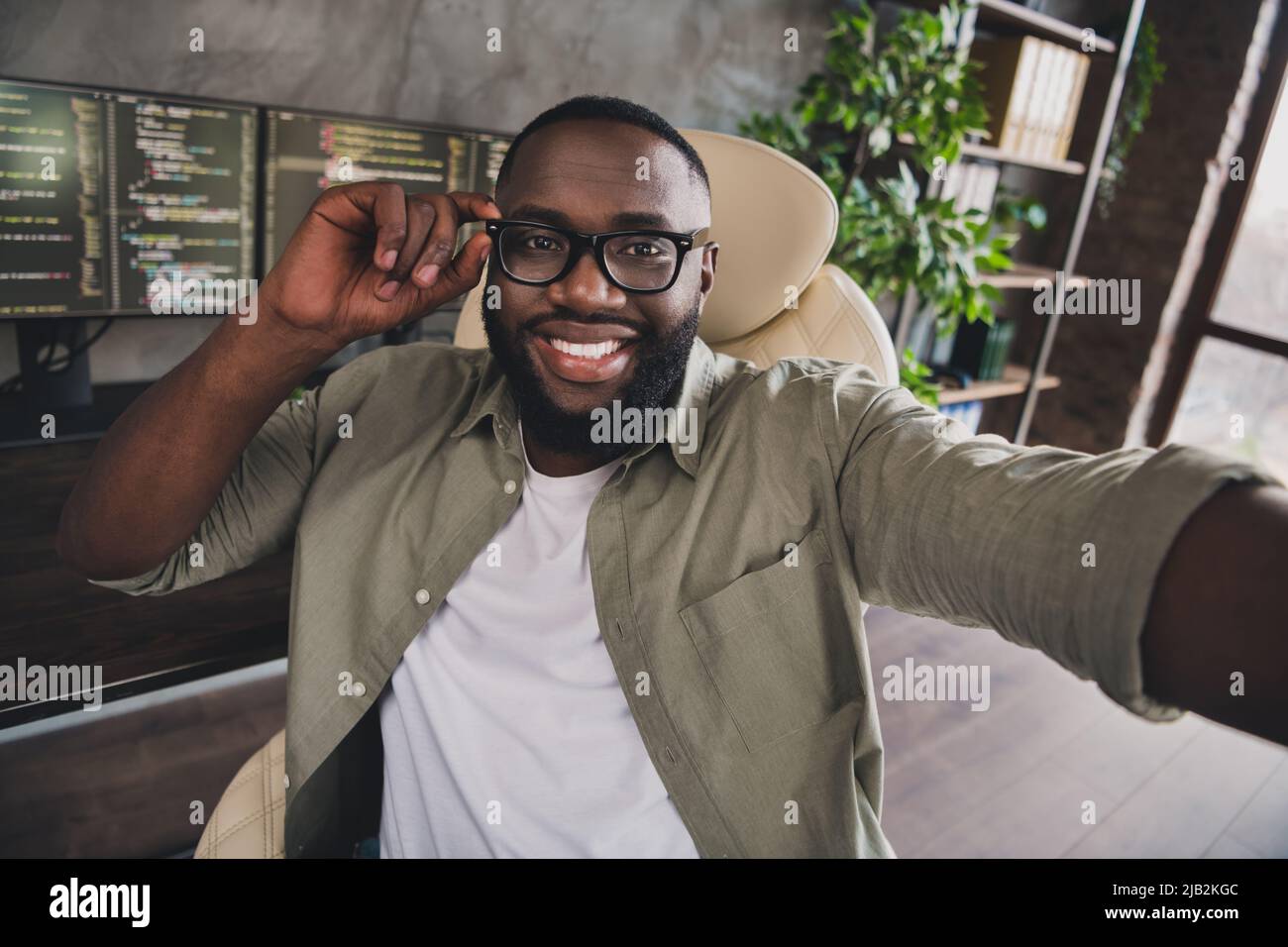 Self-portrait of attractive cheerful skilled guy expert developing ...