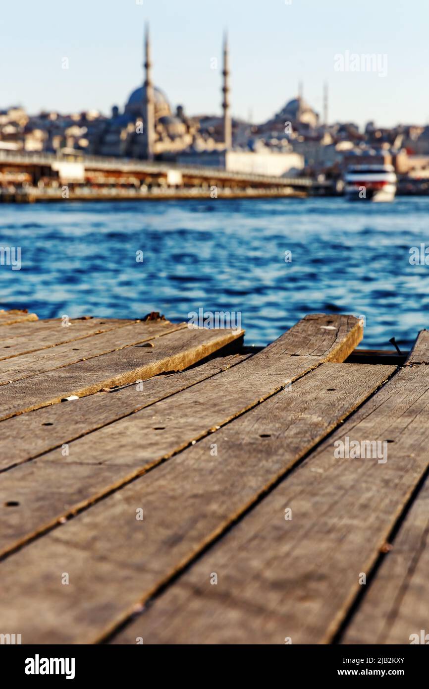 Wooden pier in old Istanbul. Boards with a background of the Bosphorus ...