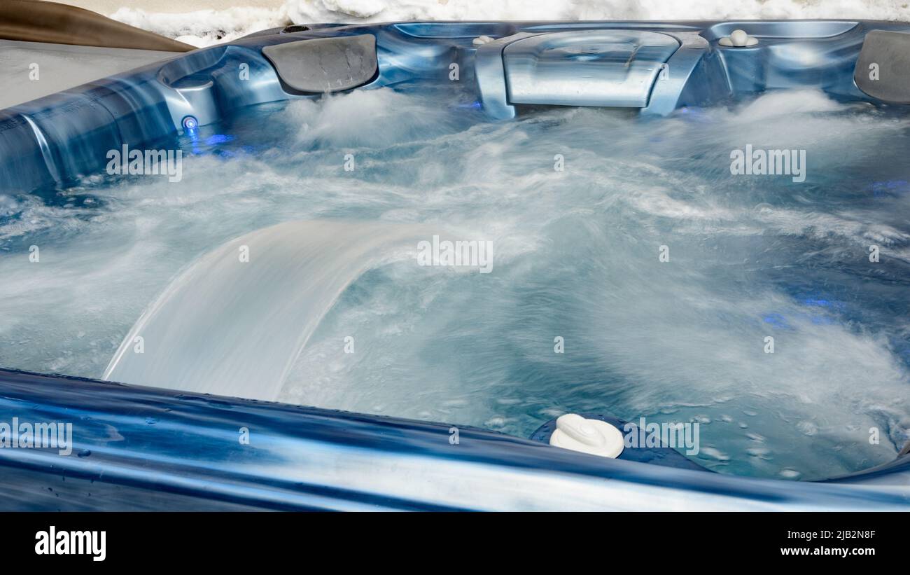 The jacuzzi is gaining water close up, relaxing in the spa, jacuzzi with bubbles Stock Photo - Alamy