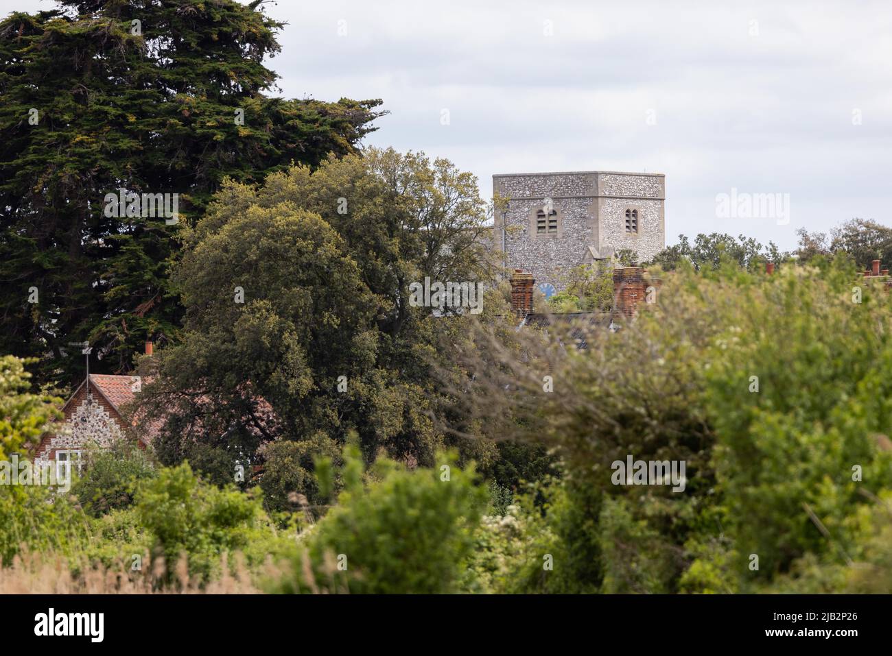 A Village Church Pops out from Dense Trees. This is the Norfolk Village ...
