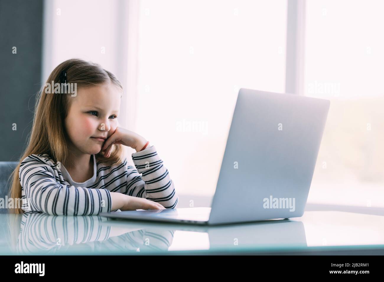 First day at school. Cute little girl children using laptop computer ...
