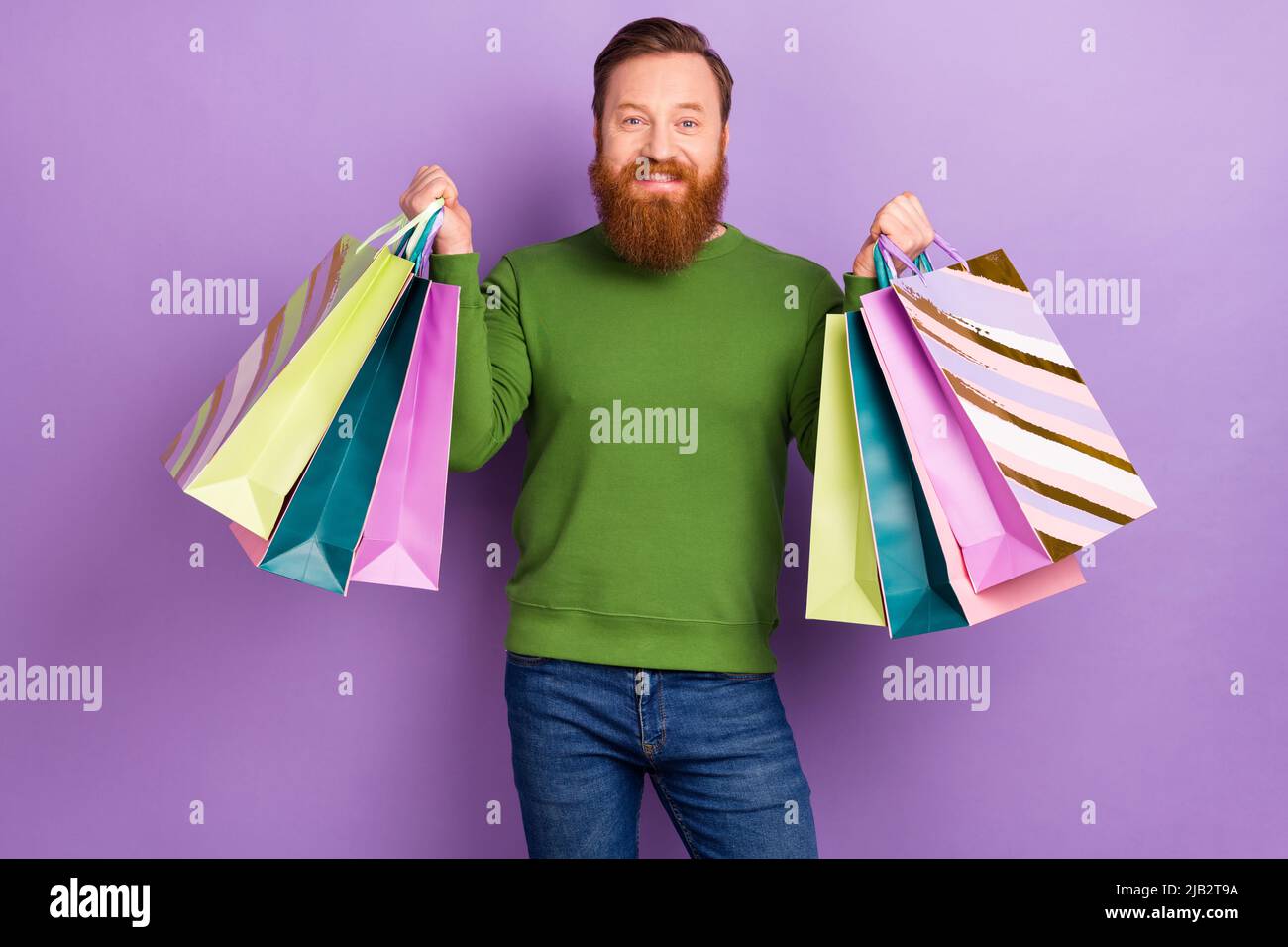 Photo of cheerful good mood young man go shopping on weekend buy ...