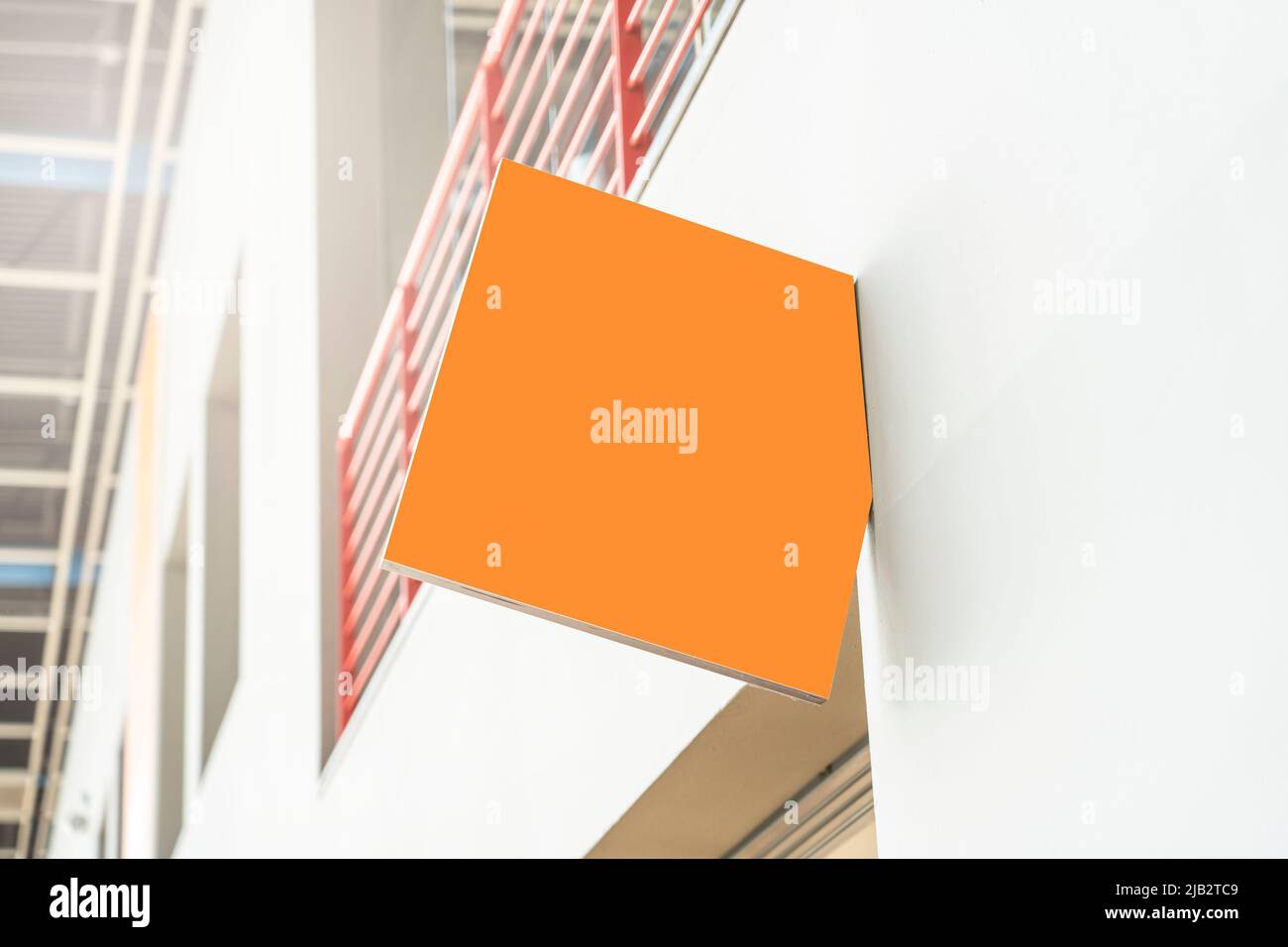 Mockup of an orange shop sign Stock Photo - Alamy