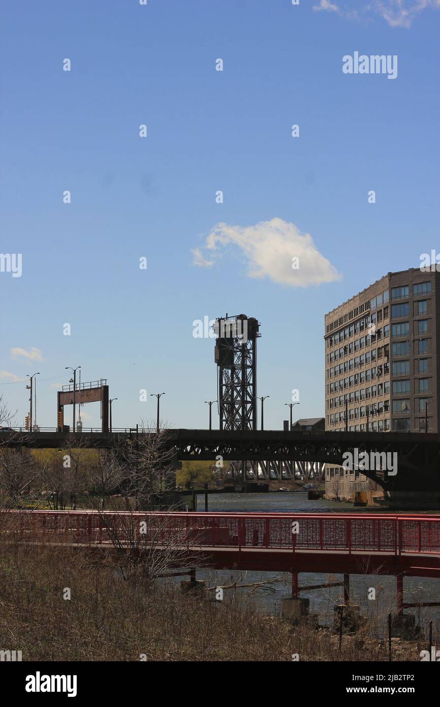 A very tall steel truss structure standing in the industrial district ...