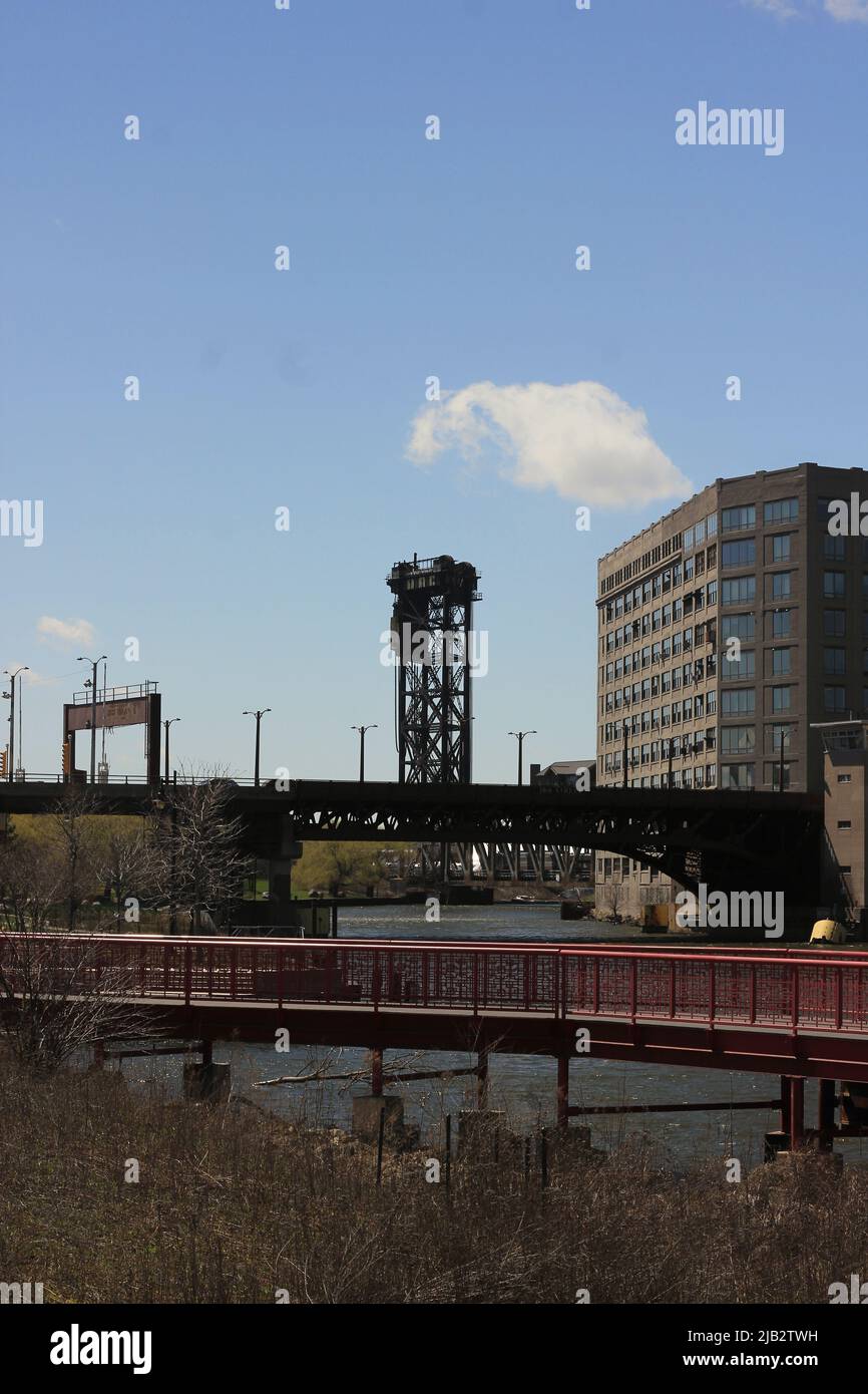 A very tall steel truss structure standing in the industrial district ...