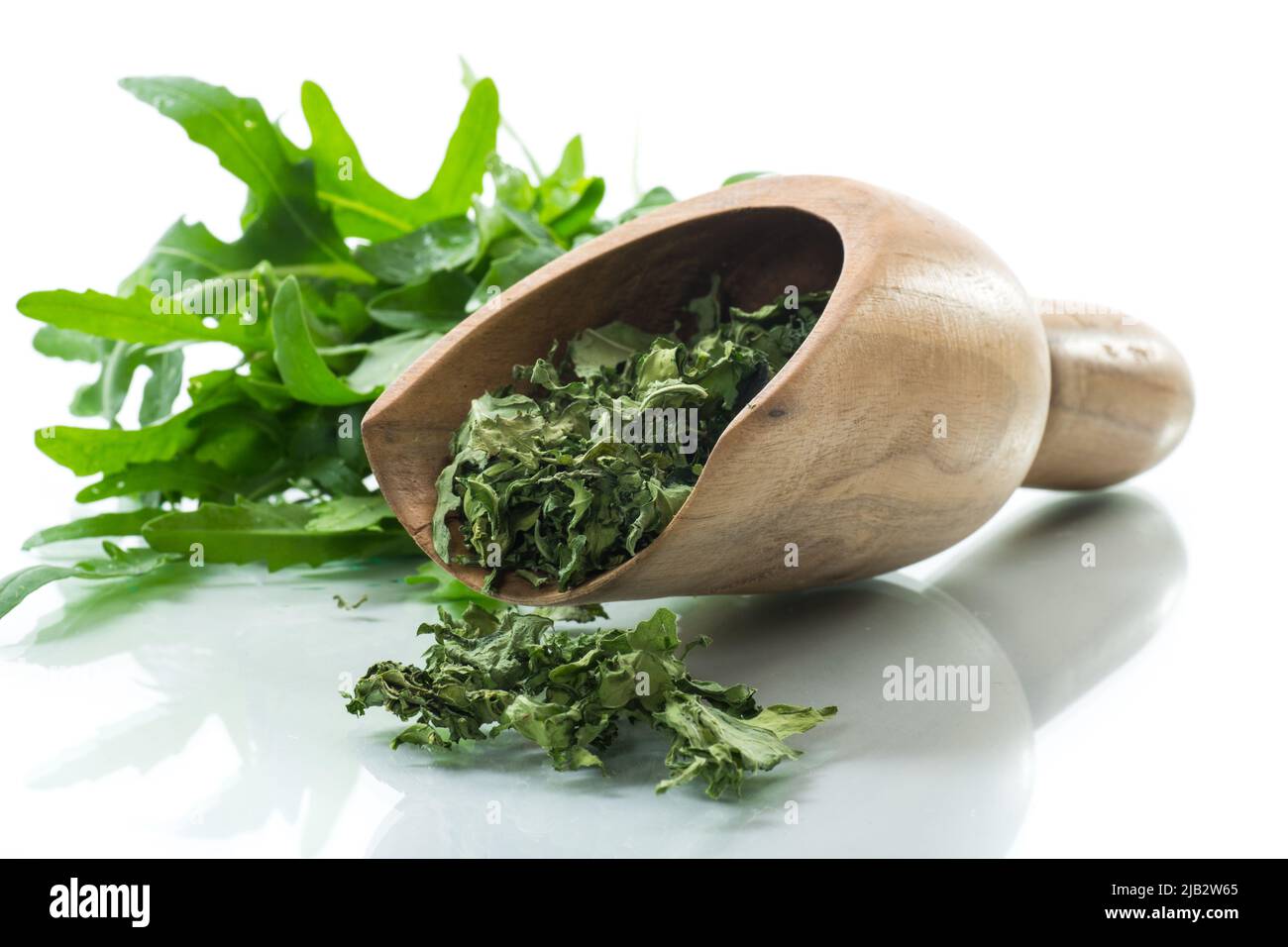 dried green organic arugula, seasoning, isolated on white background ...