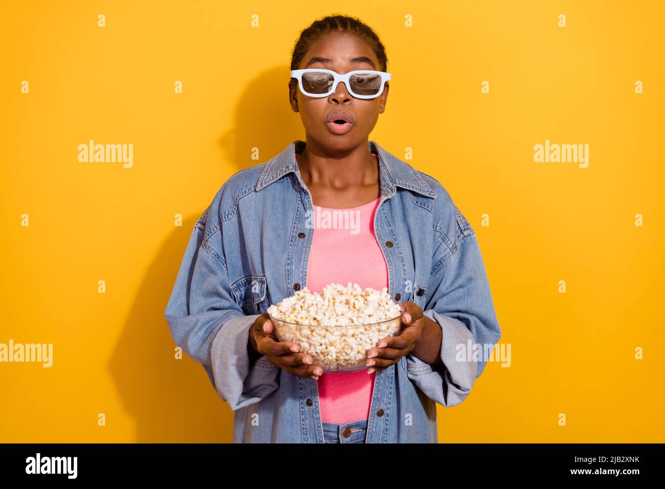 Photo of impressed lady hold popcorn plate pouted lips stare speechless ...