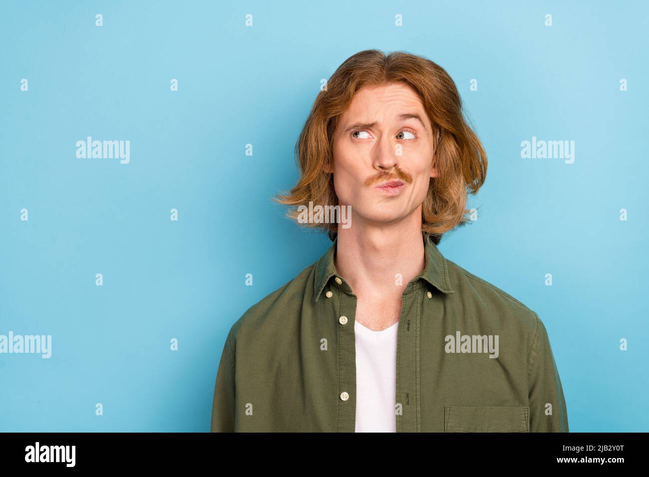 Portrait of attractive funky doubtful bewildered red-haired guy ...