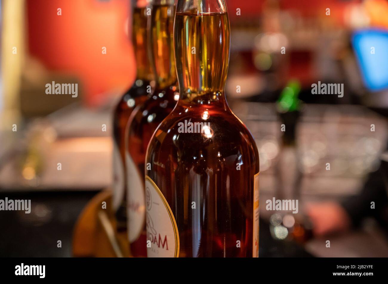 Different ages and colours of strong alcoholic apple drink calvados in ...