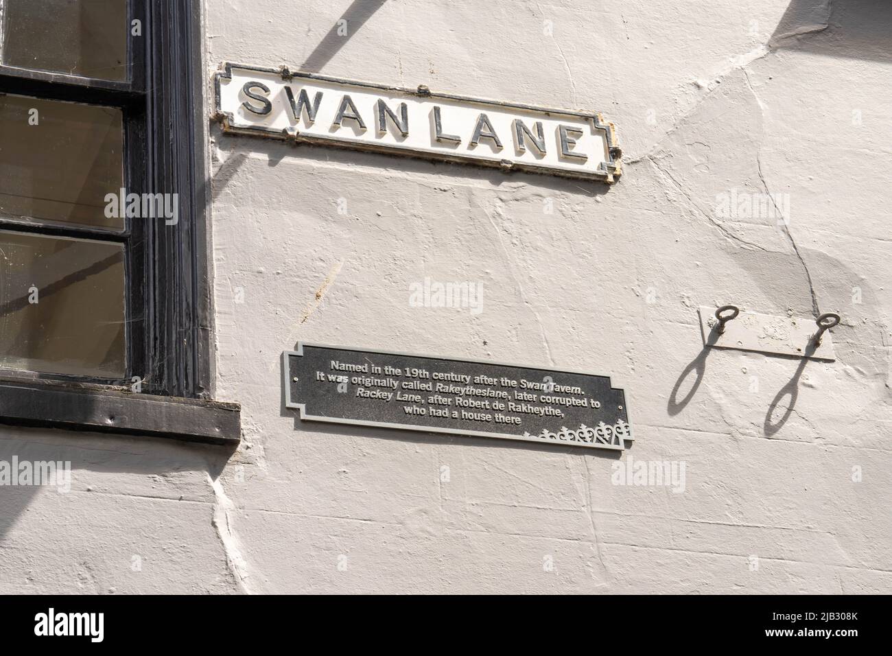 Swan Lane Norwich street sign with a histoic plaque below stating the ...