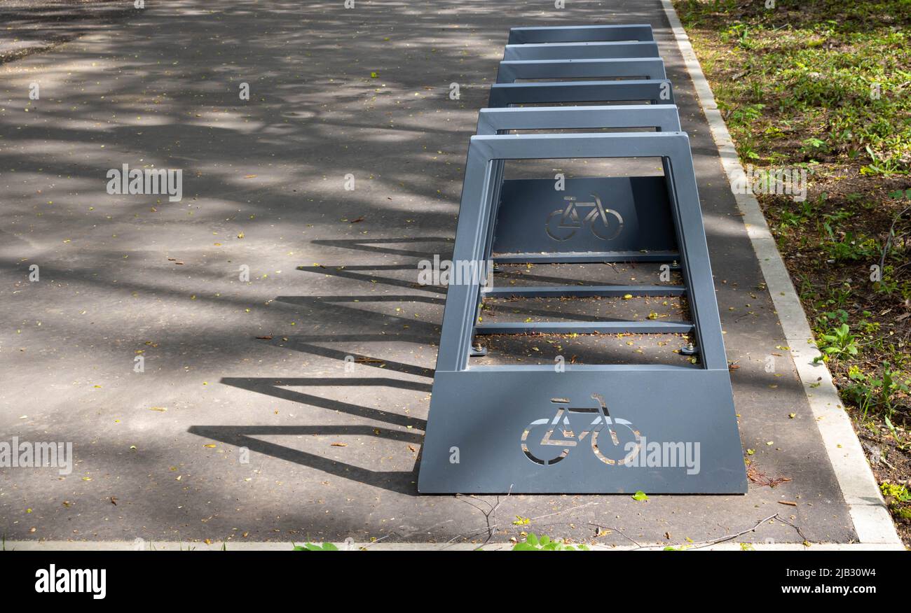 Bike rack on sidewalk with sign hi-res stock photography and images - Alamy