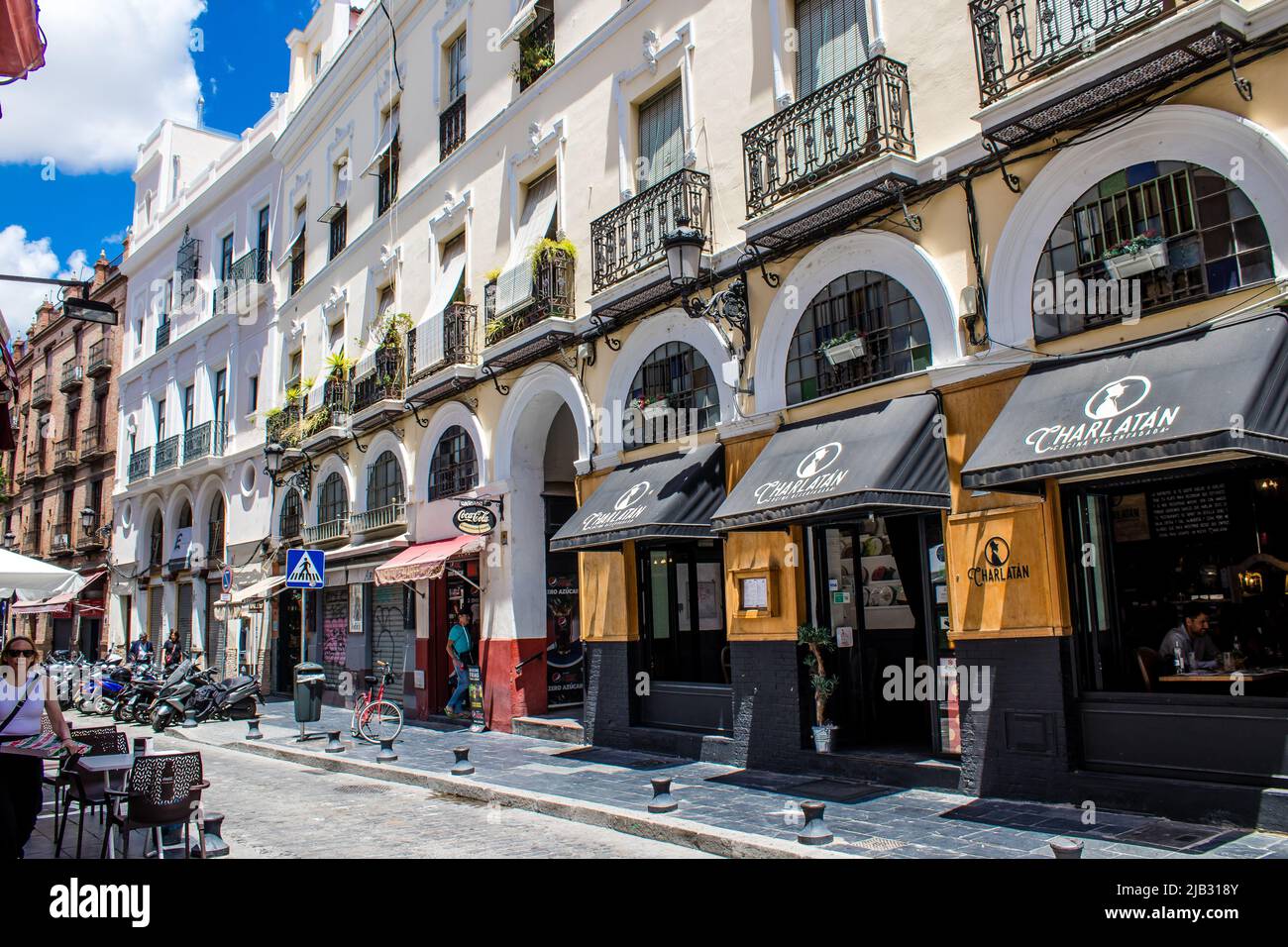 Seville, Spain - June 01, 2022 Facade of a building in the streets of ...