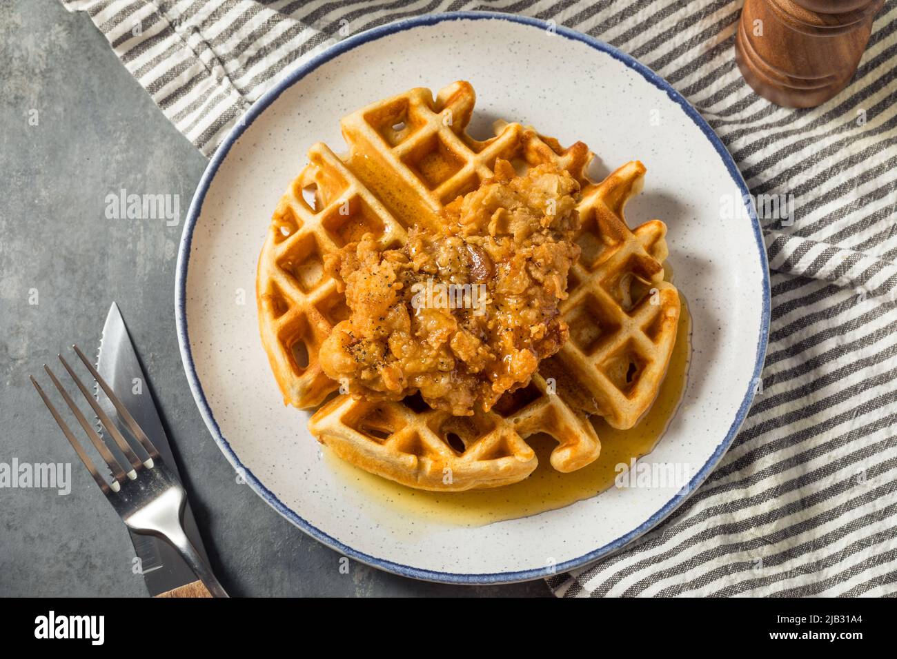 Homemade Chicken and Waffles with Syrup and Butter Stock Photo - Alamy