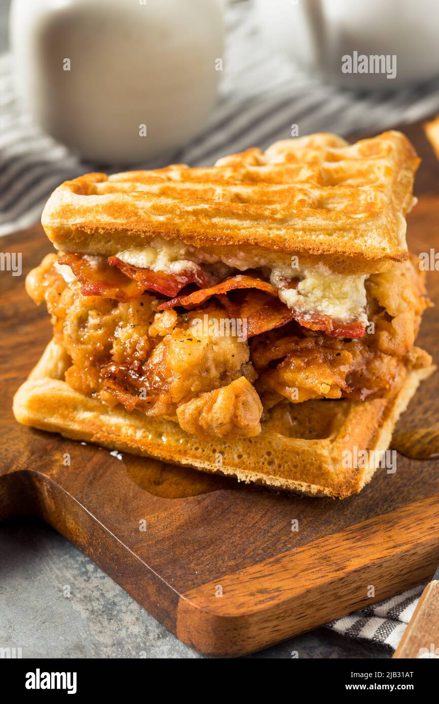 Homemade Chicken and Waffle Sandwich with Bacon and Syrup Stock Photo ...
