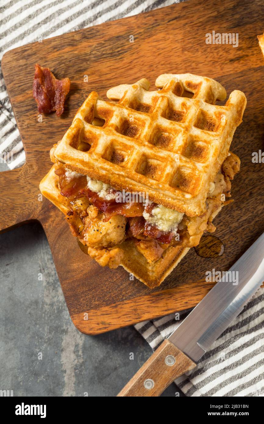 Homemade Chicken and Waffle Sandwich with Bacon and Syrup Stock Photo ...