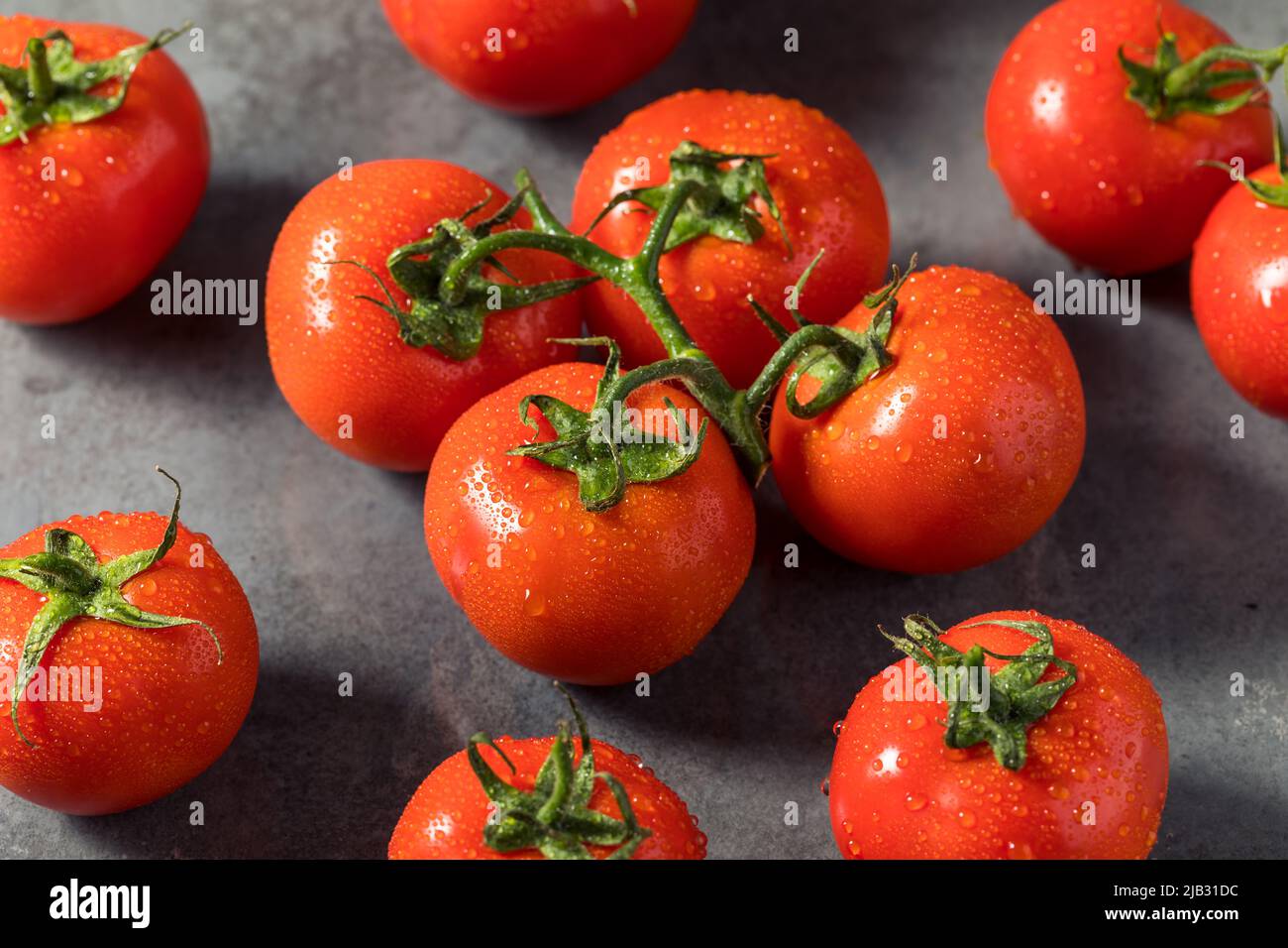 Raw Red Organic Vine Ripened Tomatoes Ready to Eat Stock Photo - Alamy
