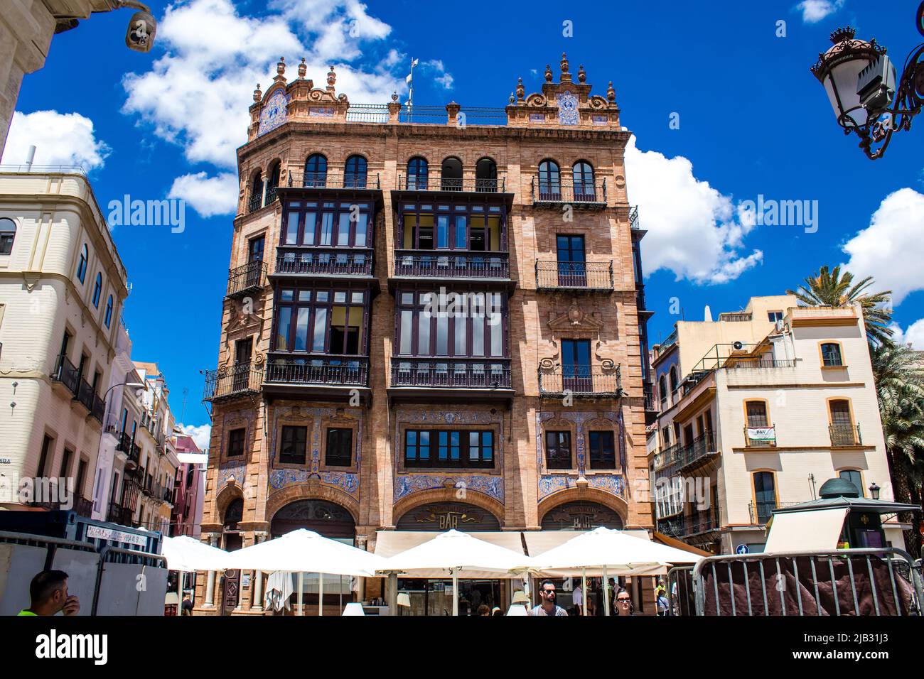 Seville, Spain - June 01, 2022 Facade of a building in the streets of ...