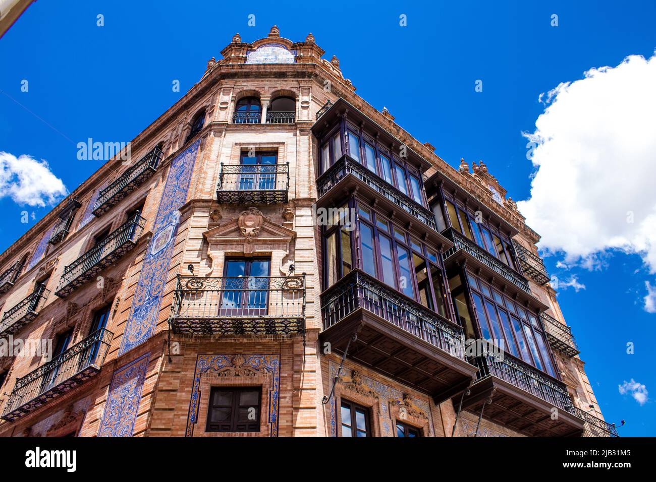 Seville, Spain - June 01, 2022 Facade of a building in the streets of ...