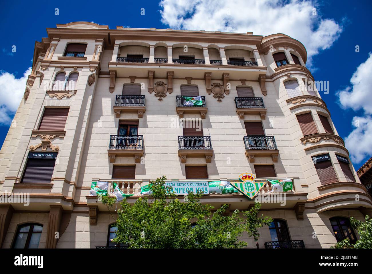 Seville, Spain - June 01, 2022 Facade of a building in the streets of ...