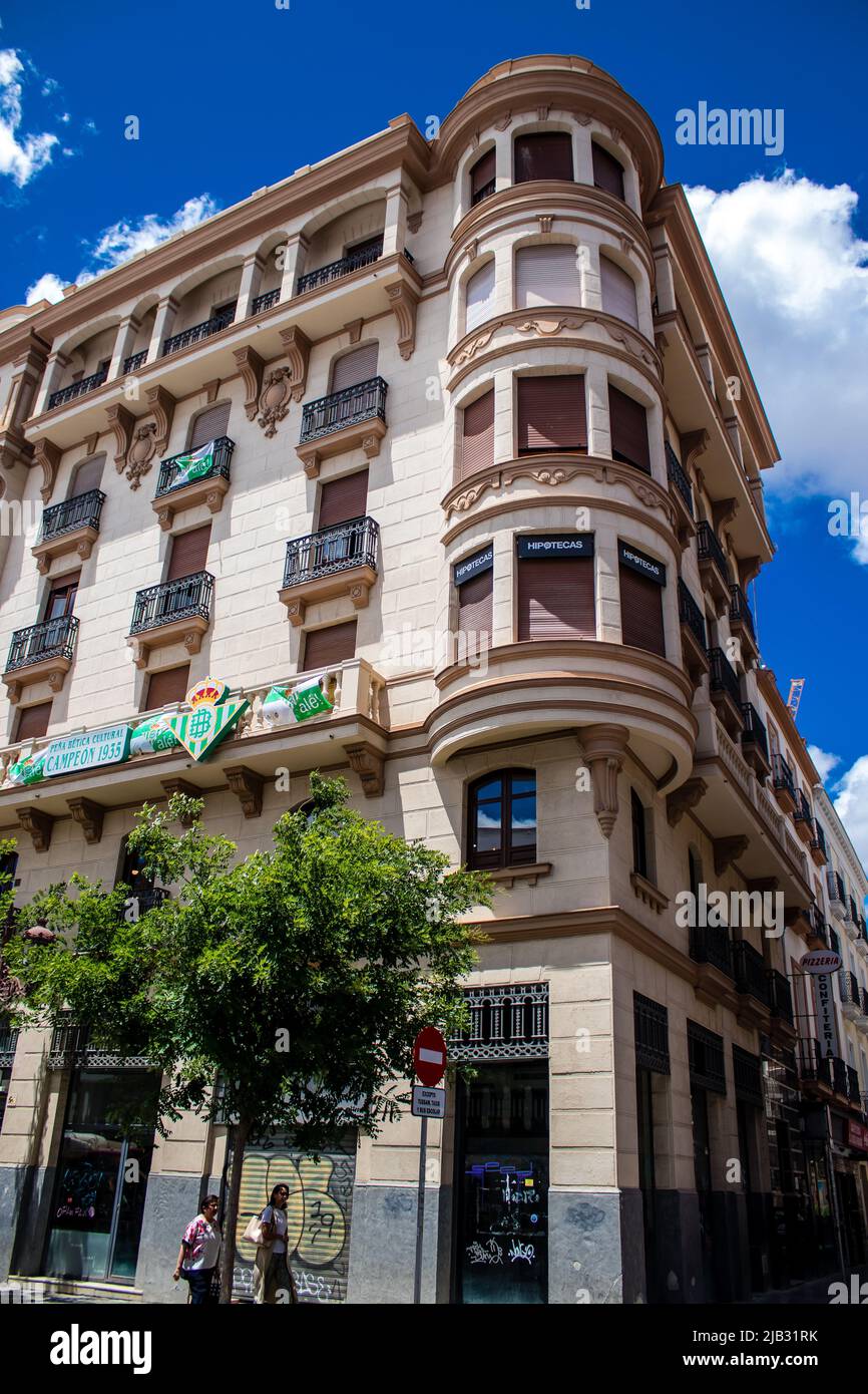 Seville, Spain - June 01, 2022 Facade of a building in the streets of ...