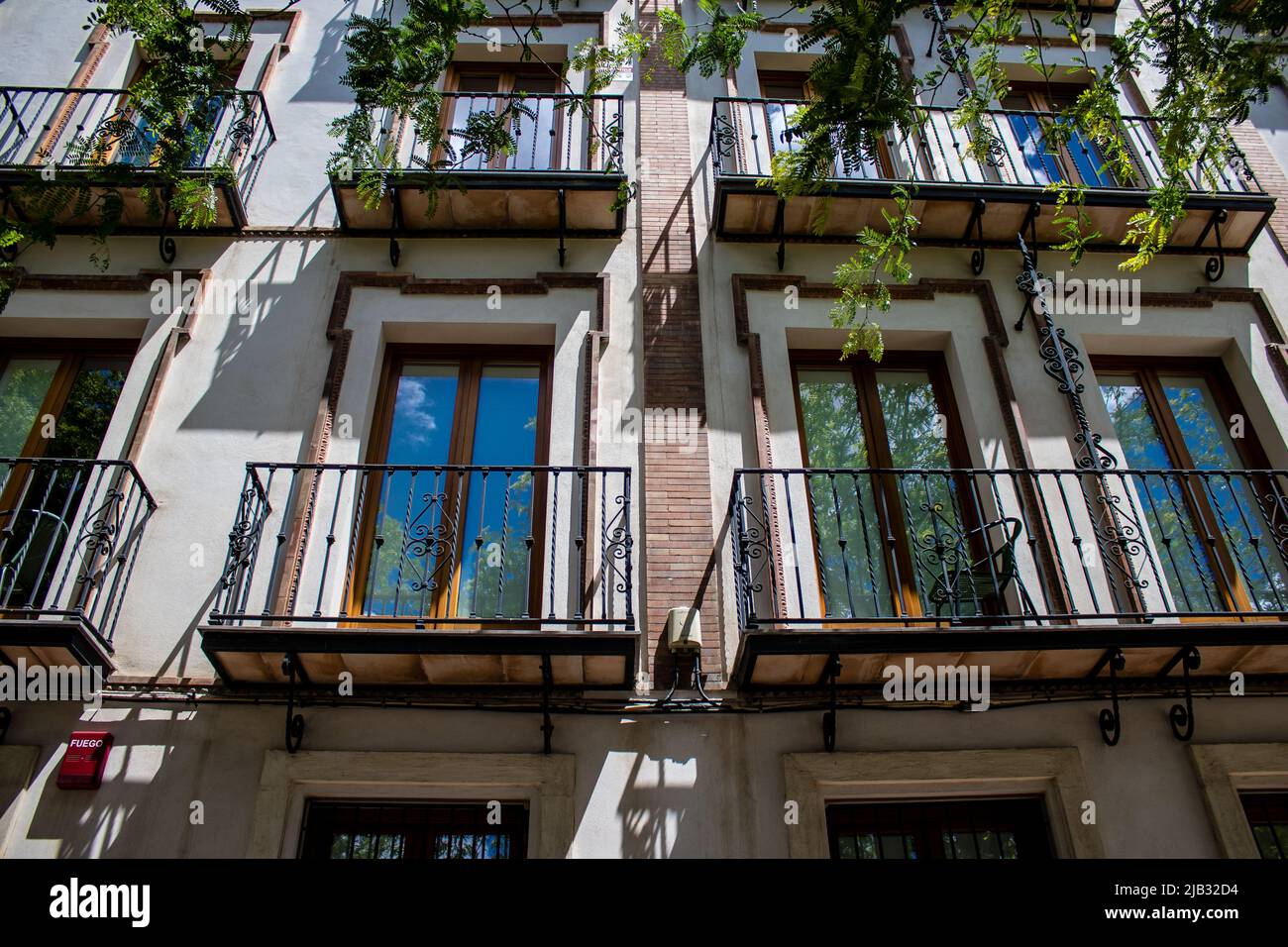 Seville, Spain - June 01, 2022 Facade of a building in the streets of ...