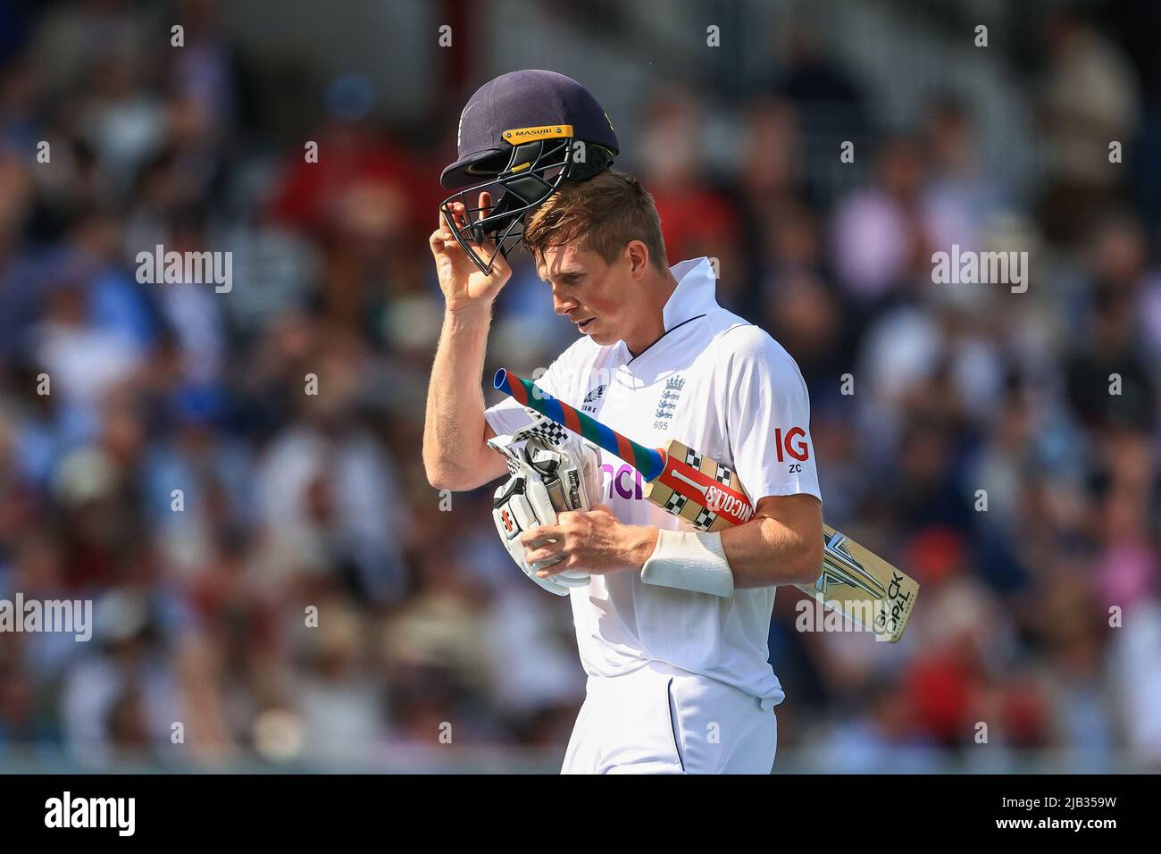 Zak Crawley of England leaves the field after being bowled by Kyle ...