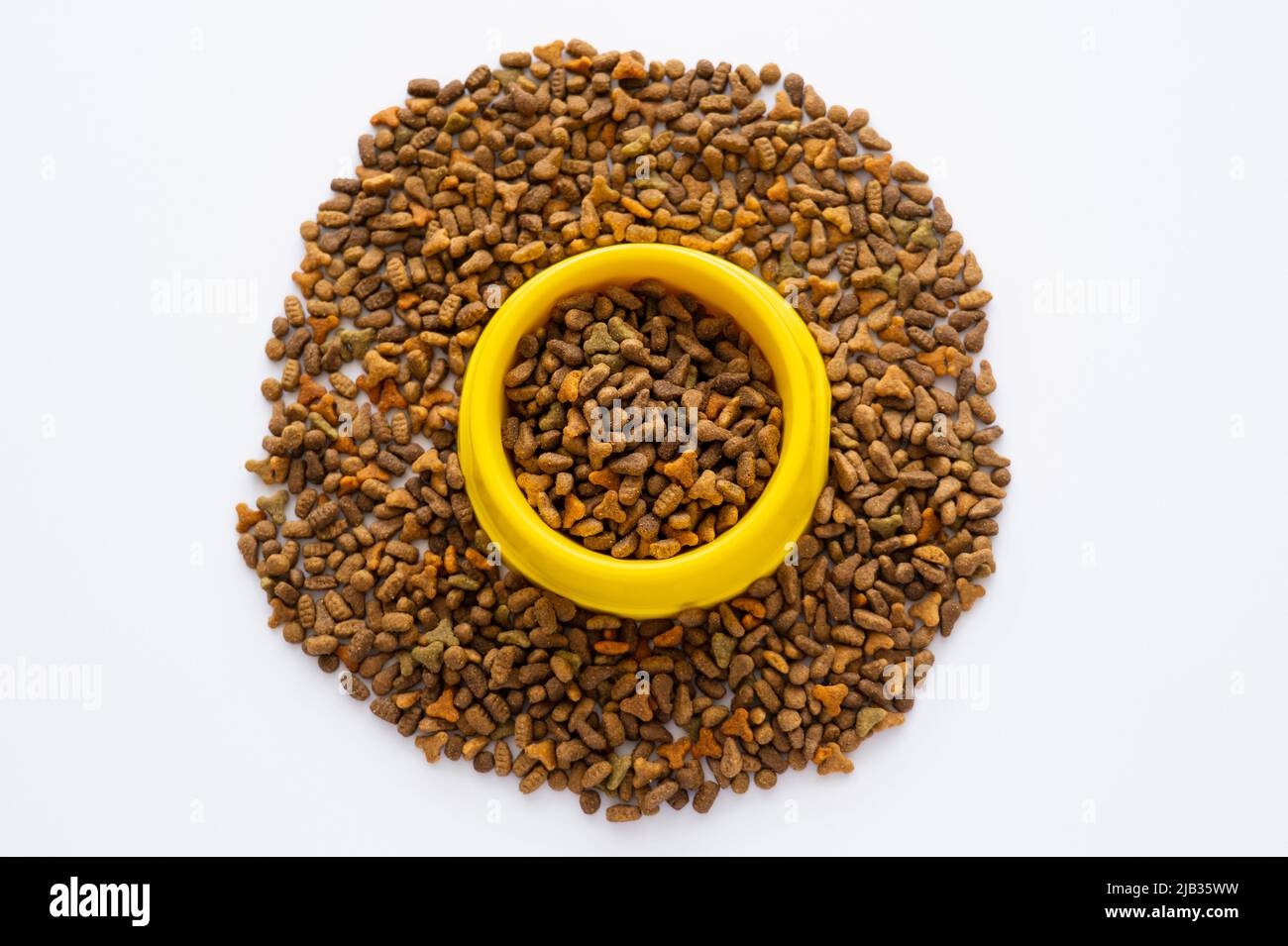 top view of cat food in yellow bowl isolated on white with copy space ...