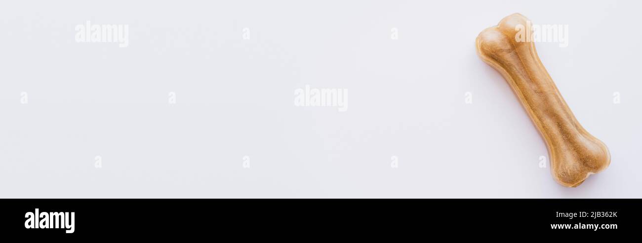 top view of bone shaped pet treat isolated on white, banner Stock Photo ...