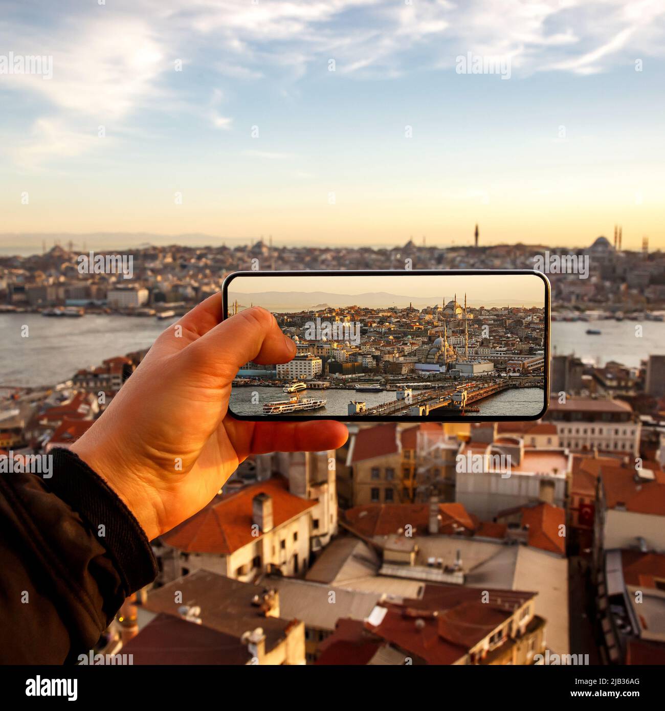 Taking photos and video of sunset Istanbul landscape via smartphone ...
