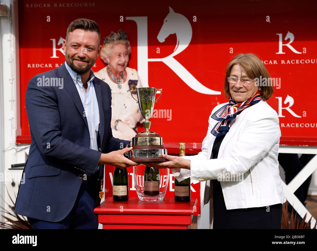 Charlie Johnston, trainer of Forest Falcon, presented with the trophy ...