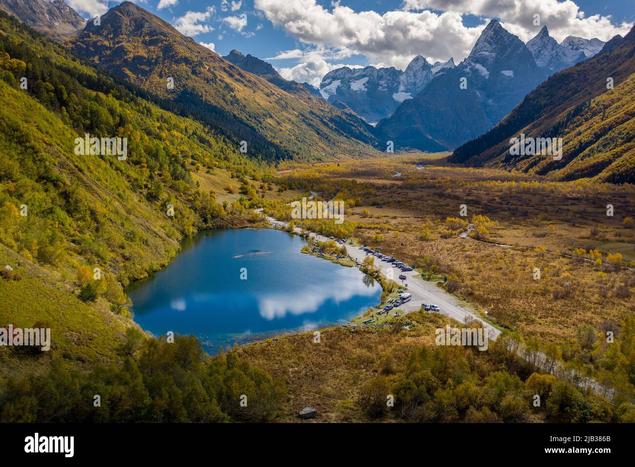 Drone view of a beautiful valley with a small lake Stock Photo - Alamy