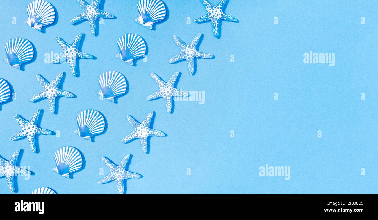 Blue summer background of decorative glass sea conch pattern with copy ...