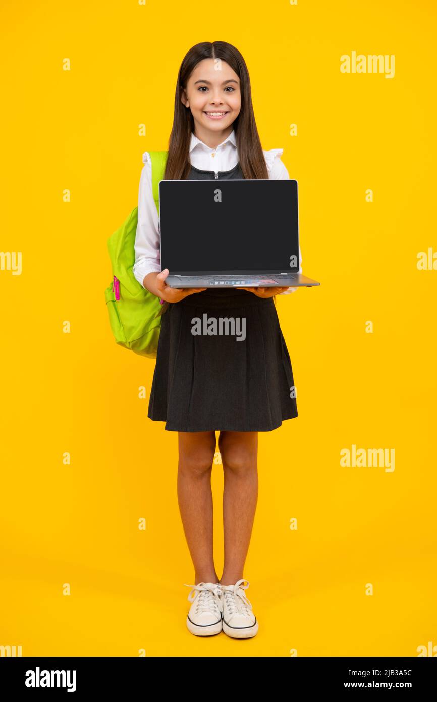 Back to school, Teenager school girl with laptop computer. Happy girl ...