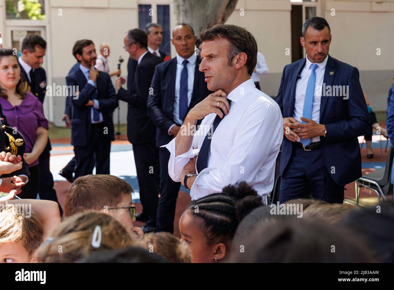 French President Emmanuel Macron during a visit to the Menpenti school ...