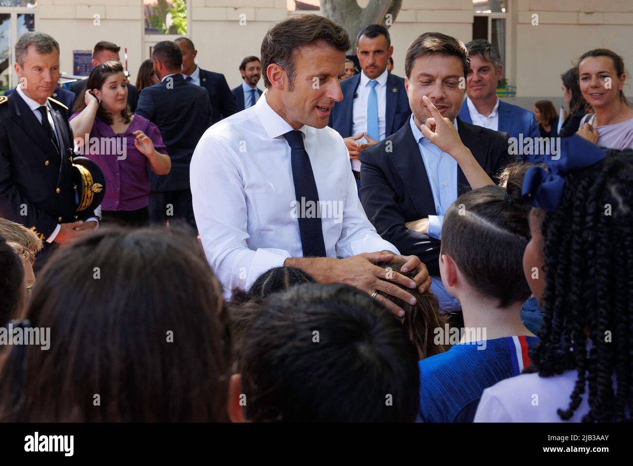 French President Emmanuel Macron during a visit to the Menpenti school ...