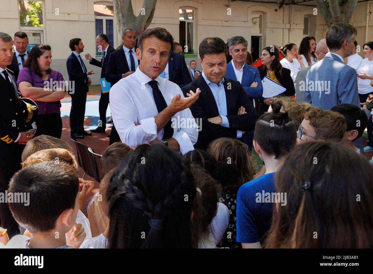 French President Emmanuel Macron during a visit to the Menpenti school ...