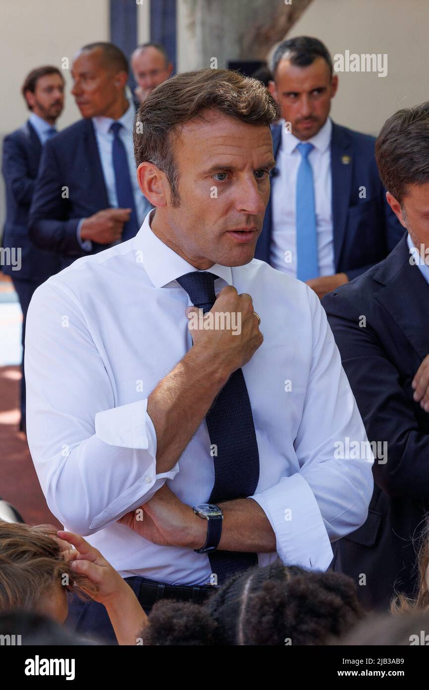 French President Emmanuel Macron during a visit to the Menpenti school ...