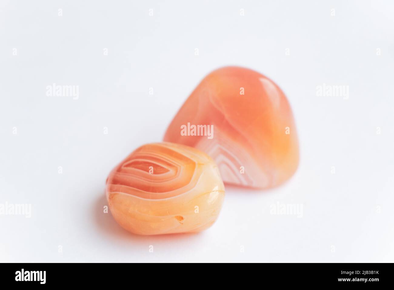 collection of gemstones orange agate on white background Stock Photo ...