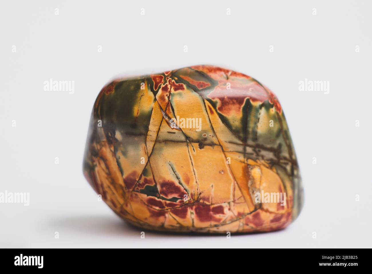 natural large jasper stone on a white background Stock Photo - Alamy
