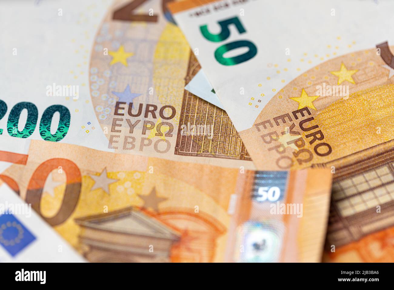 Fifty euro spread out as background, orange banknotes from european ...