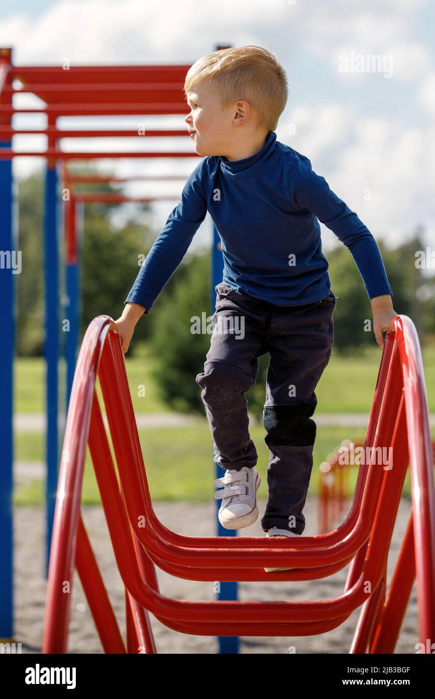 Person climbing a ladder hi-res stock photography and images - Alamy