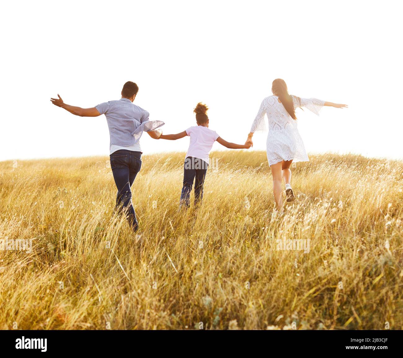 Happy family together bonding outdoors Stock Photo - Alamy
