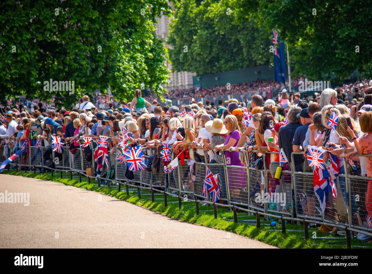 London, UK. 02nd June, 2022. Fans patiently await to view the parade ...