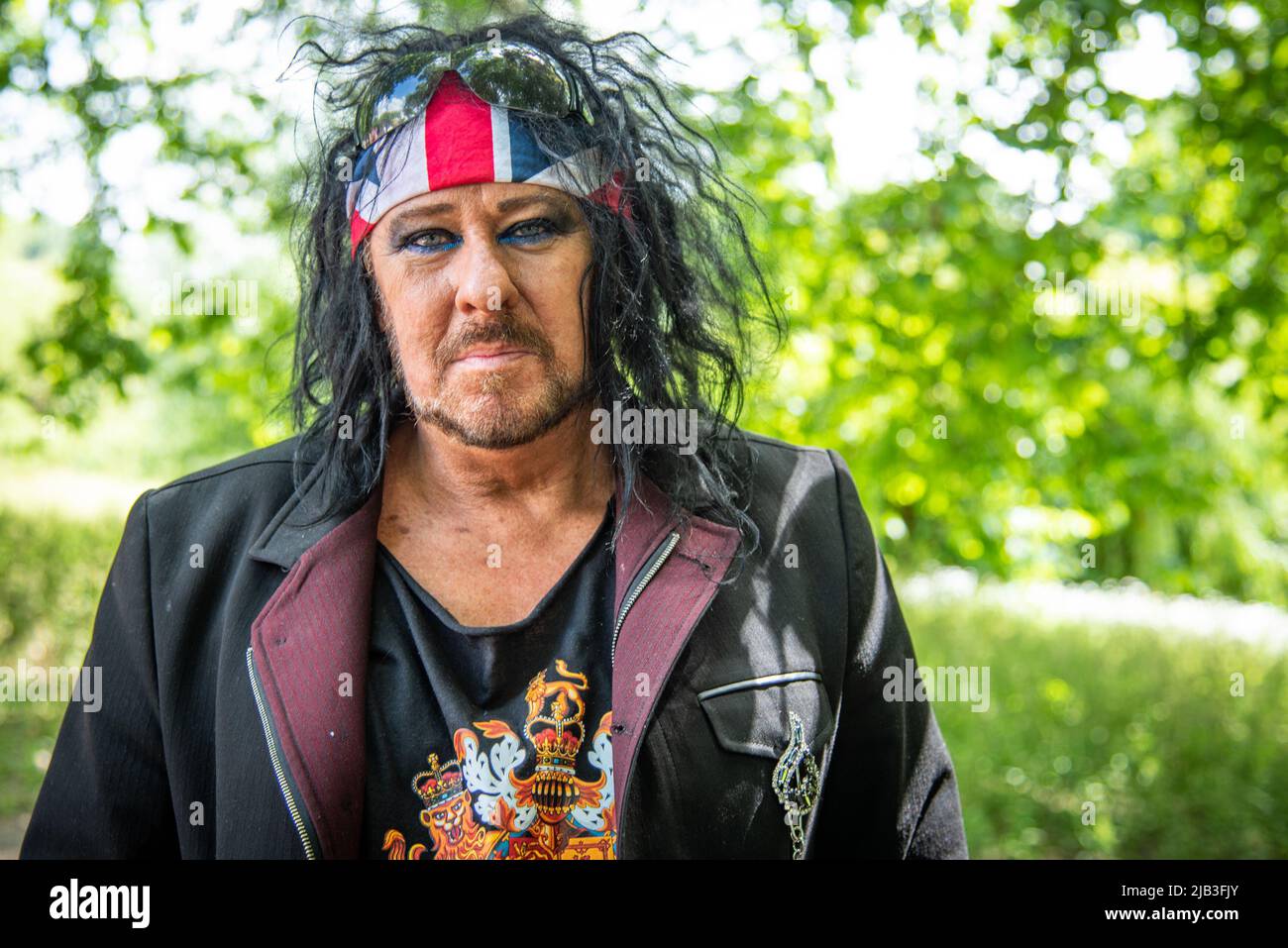 A fan wears a British head band during the Queen Elizabeth II Platinum ...