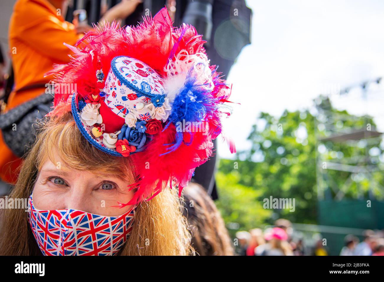 A fan is adorned in celebratory hat during the Queen Elizabeth II ...