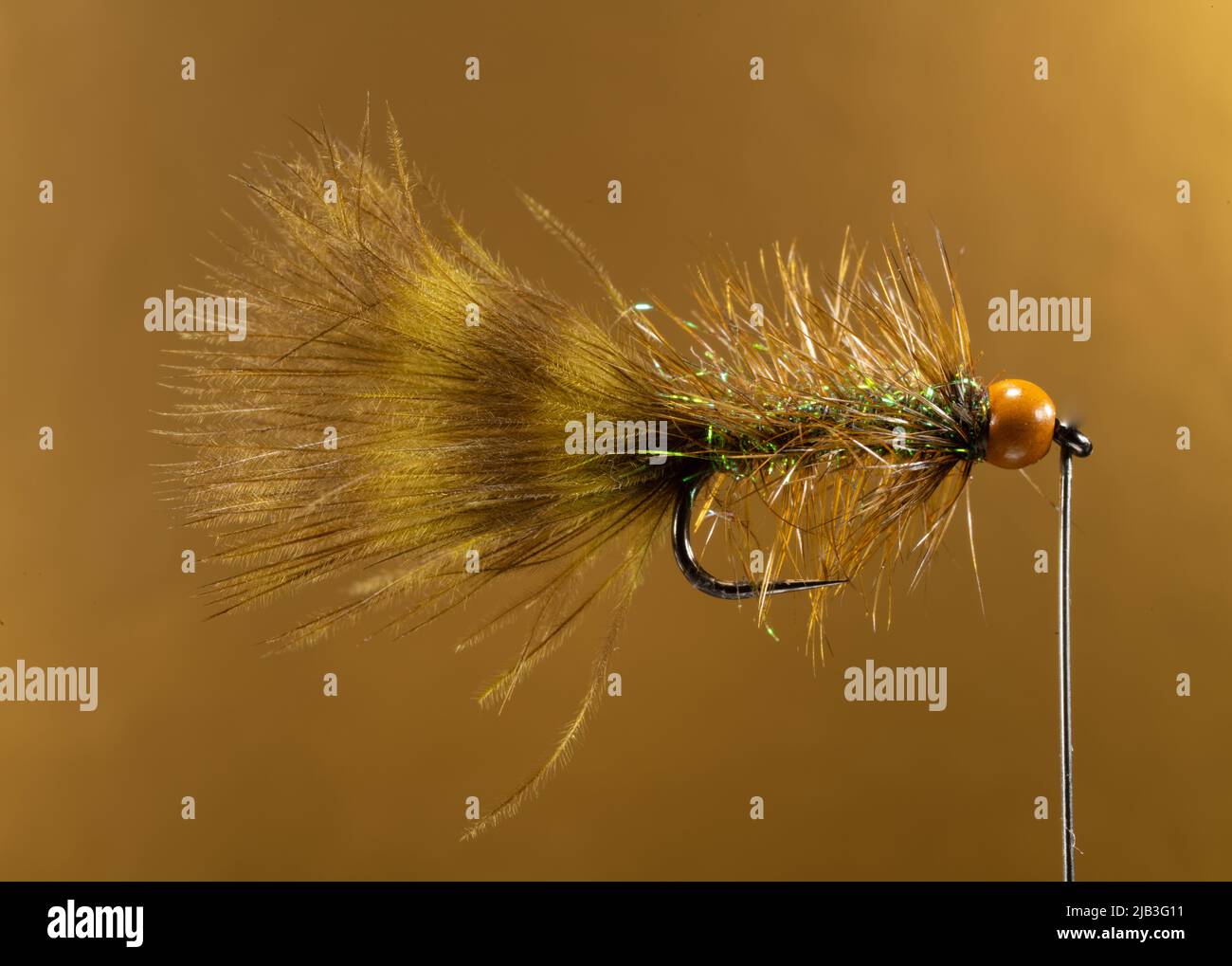 Fly for trout fishing, prepared for catching fish with barbless hook ...