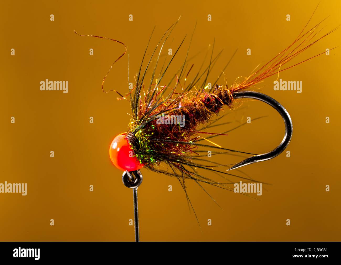 Fly for trout fishing, prepared for catching fish with barbless hook ...
