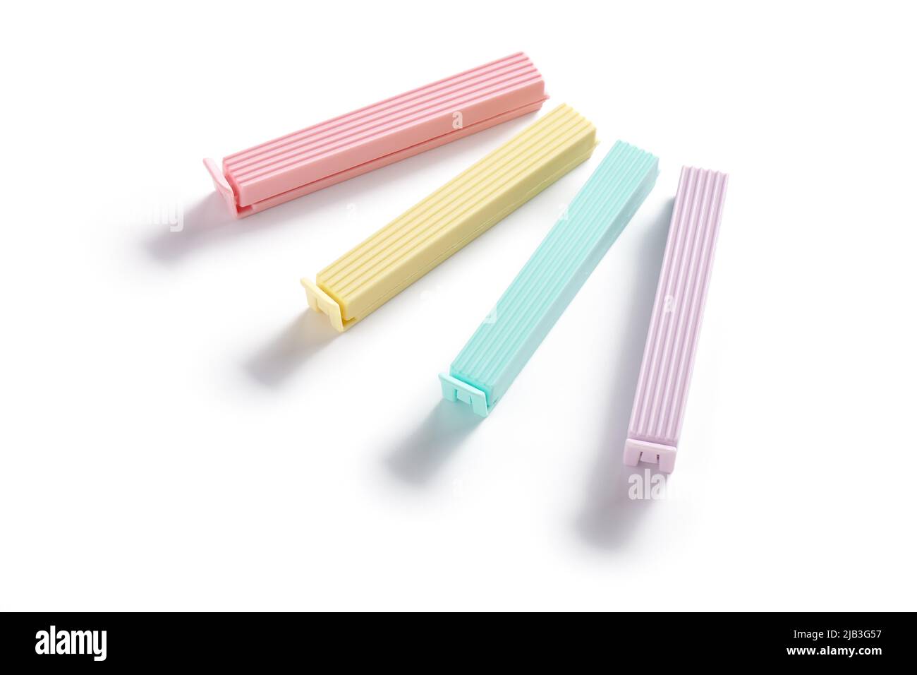 Plastic bag clips on a white background, photo stacking Stock Photo - Alamy