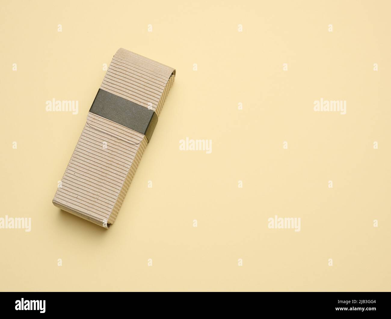 Rectangular brown corrugated box for packing goods, perfumes, creams ...